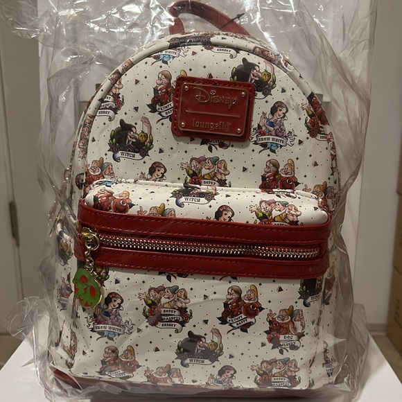 Loungefly | Bags | Loungefly Disney Snow White Tattoo Aop Mini Backpack ...